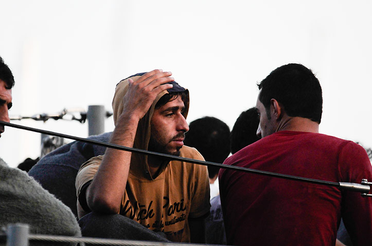 Migrant boat capsizes - in pictures