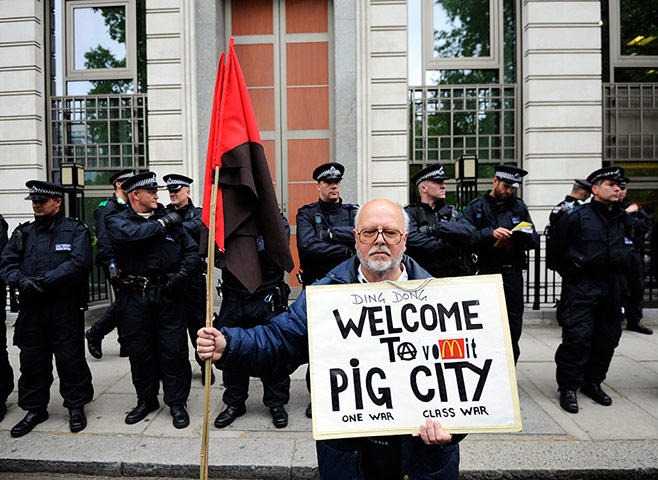 Police raid anti-G8 protests in London – in pictures