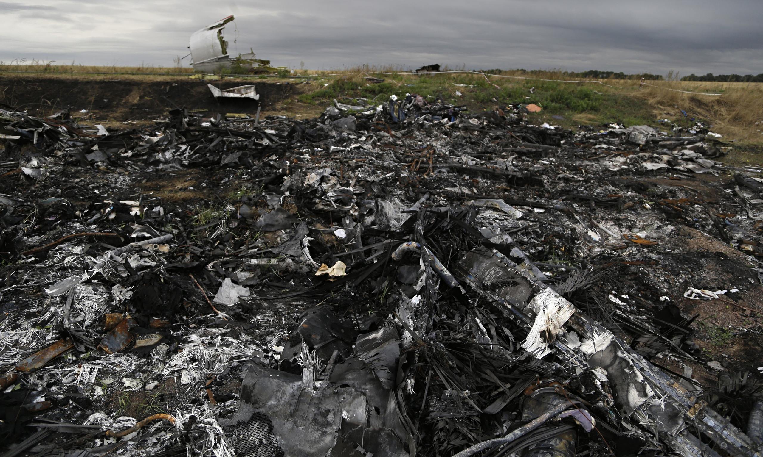 mh17-crash-site-still-littered-with-debris-world-news-the-guardian