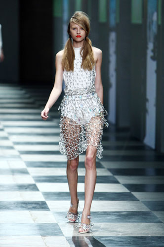 Models in see-through clothes at Milan fashion week